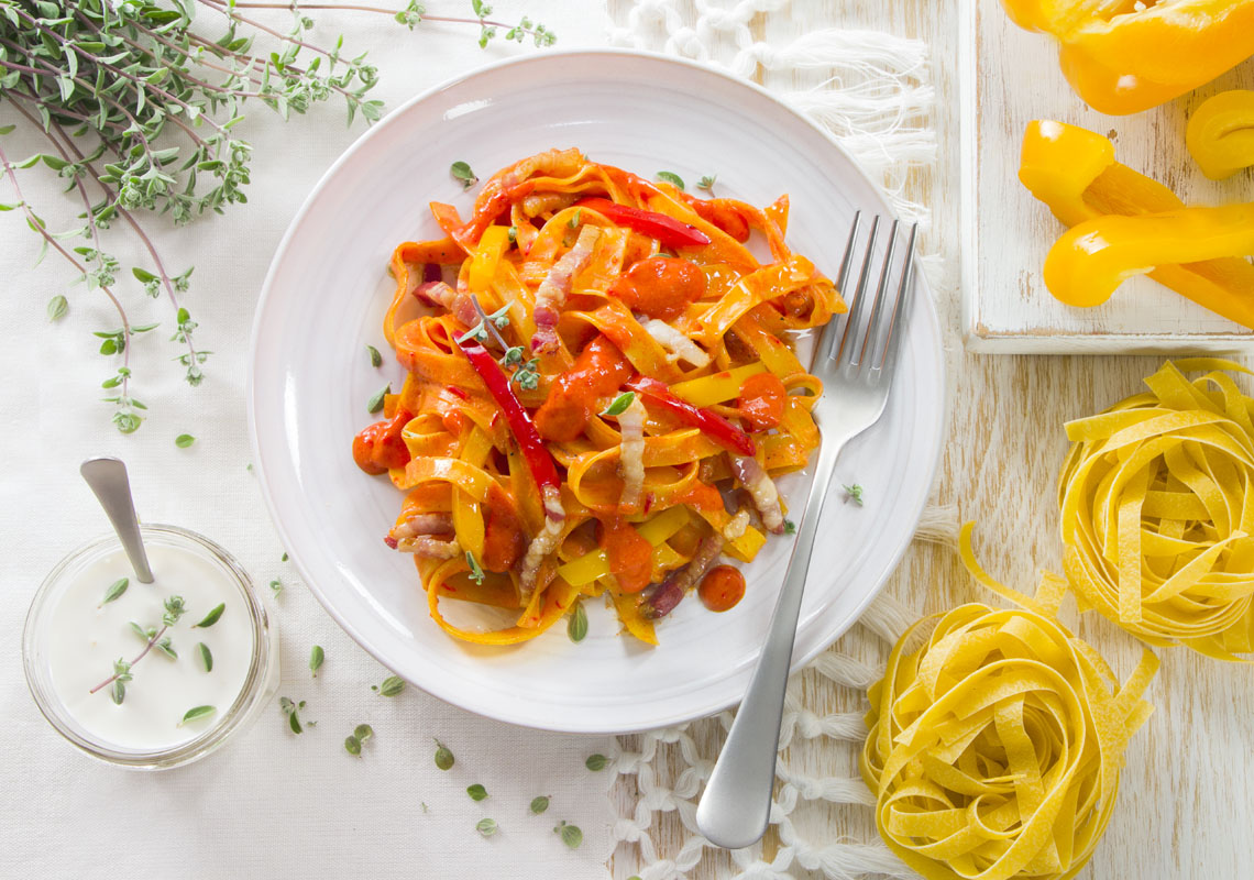 Tagliatelle with Cooking Cream and Bell Peppers Sauce and Bacon ...
